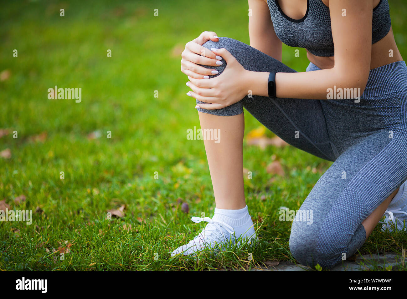 Leg Injury. Fitness Woman Suffering From Pain In Leg After Workout ...
