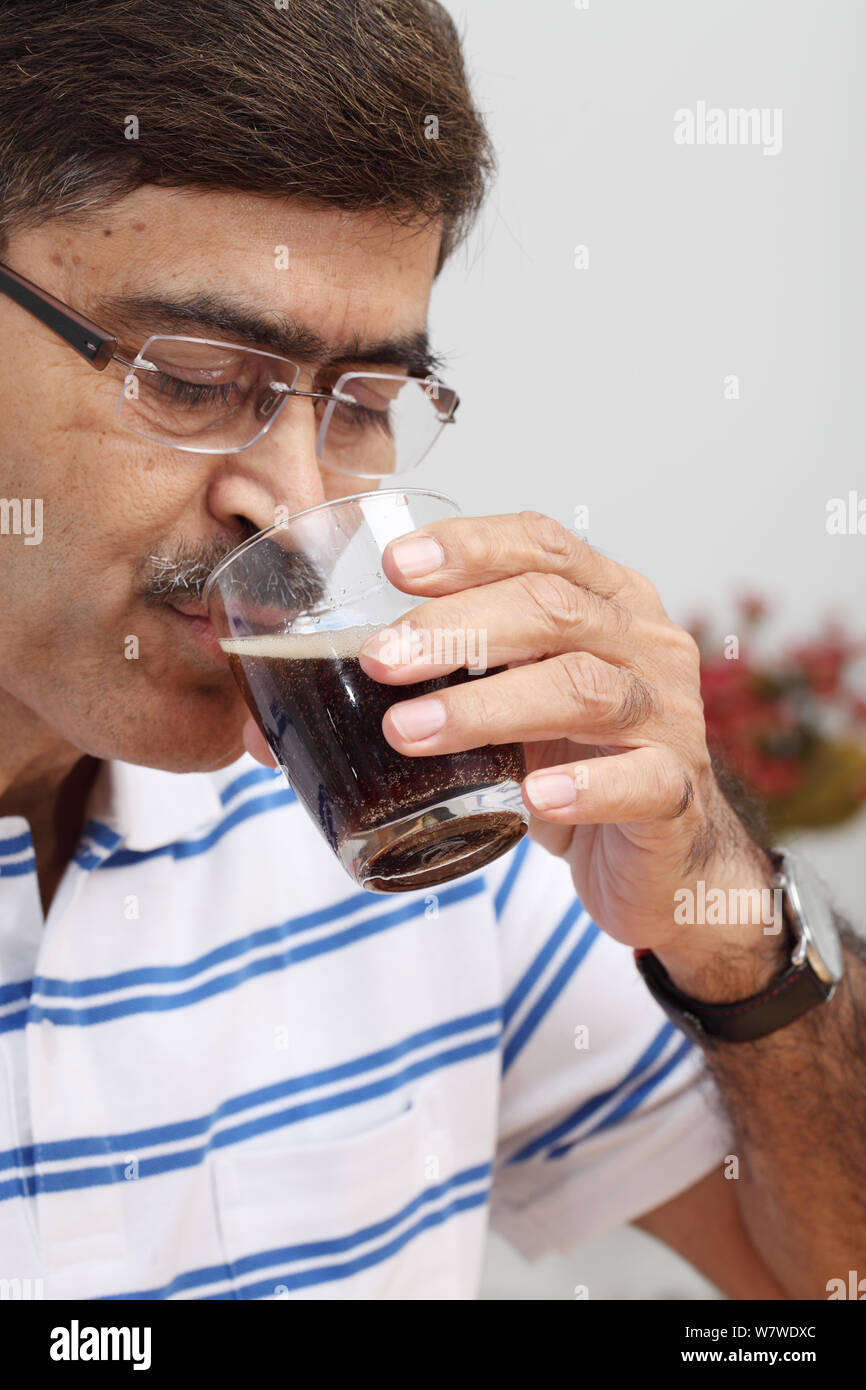 Man drinking coca cola hi-res stock photography and images - Alamy