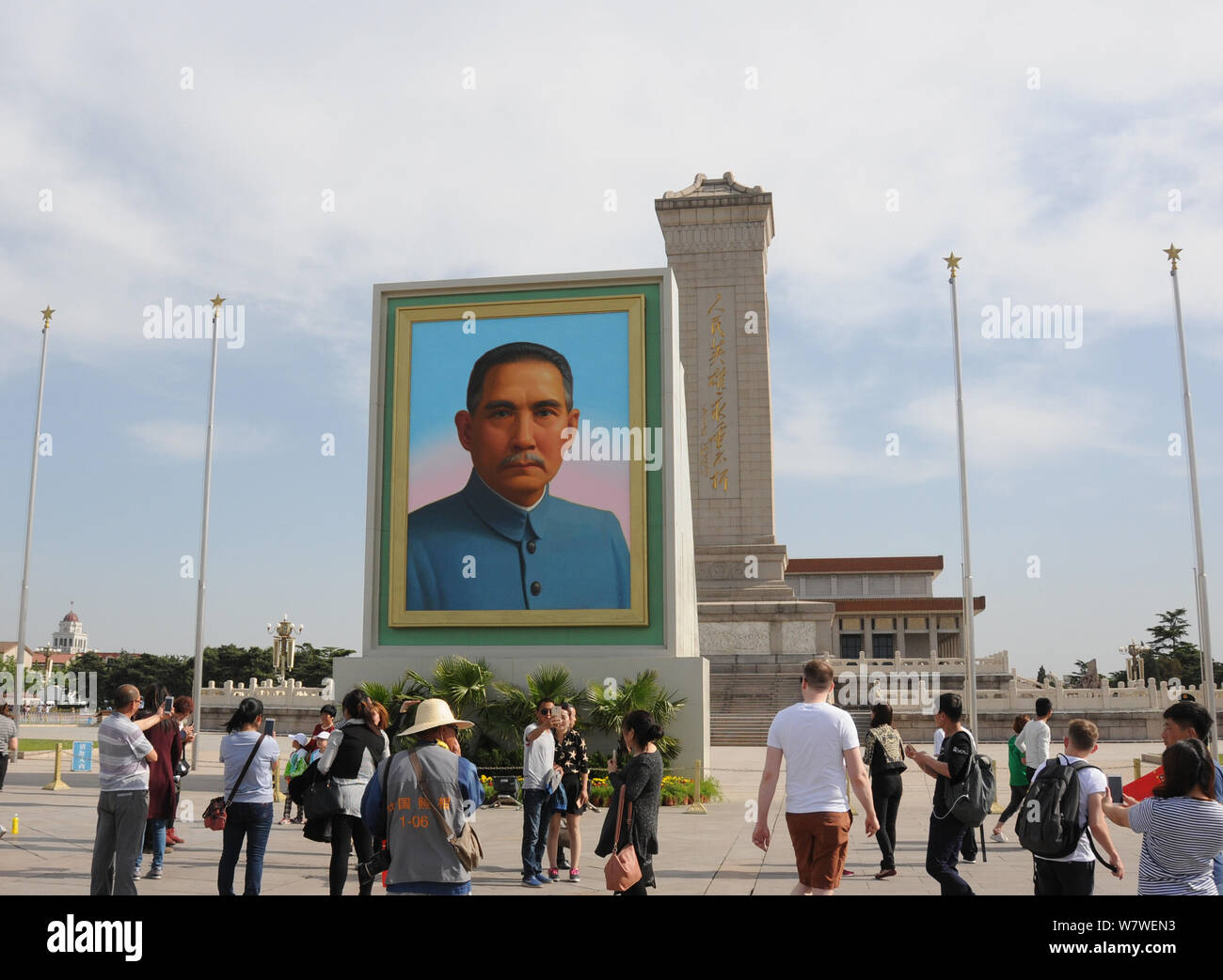 Visitors take photos of the huge portrait of Sun Yat-sen, first ...
