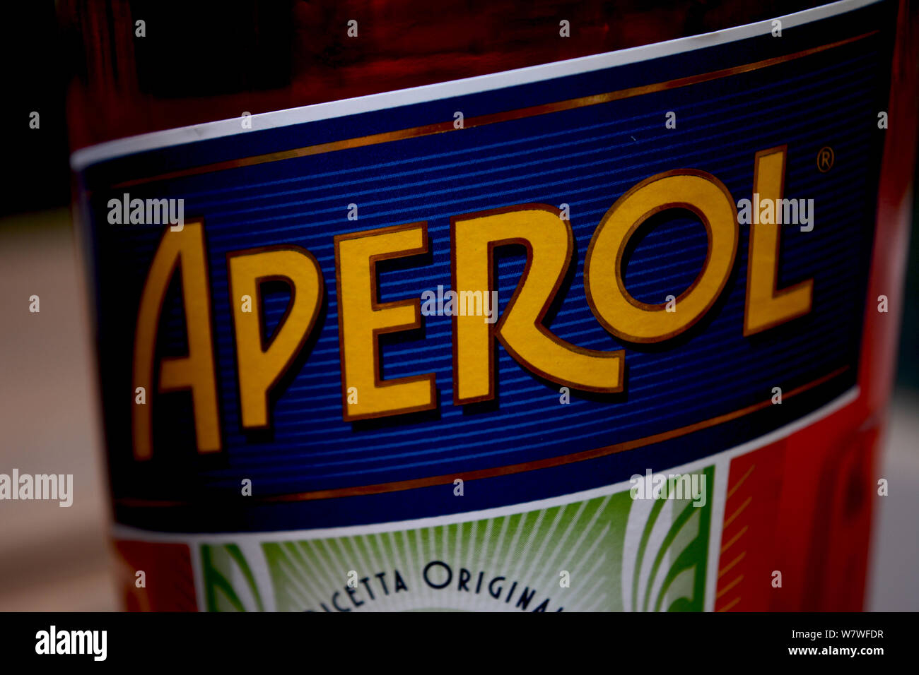 Aperol logo on shiny bottle, close up Stock Photo - Alamy