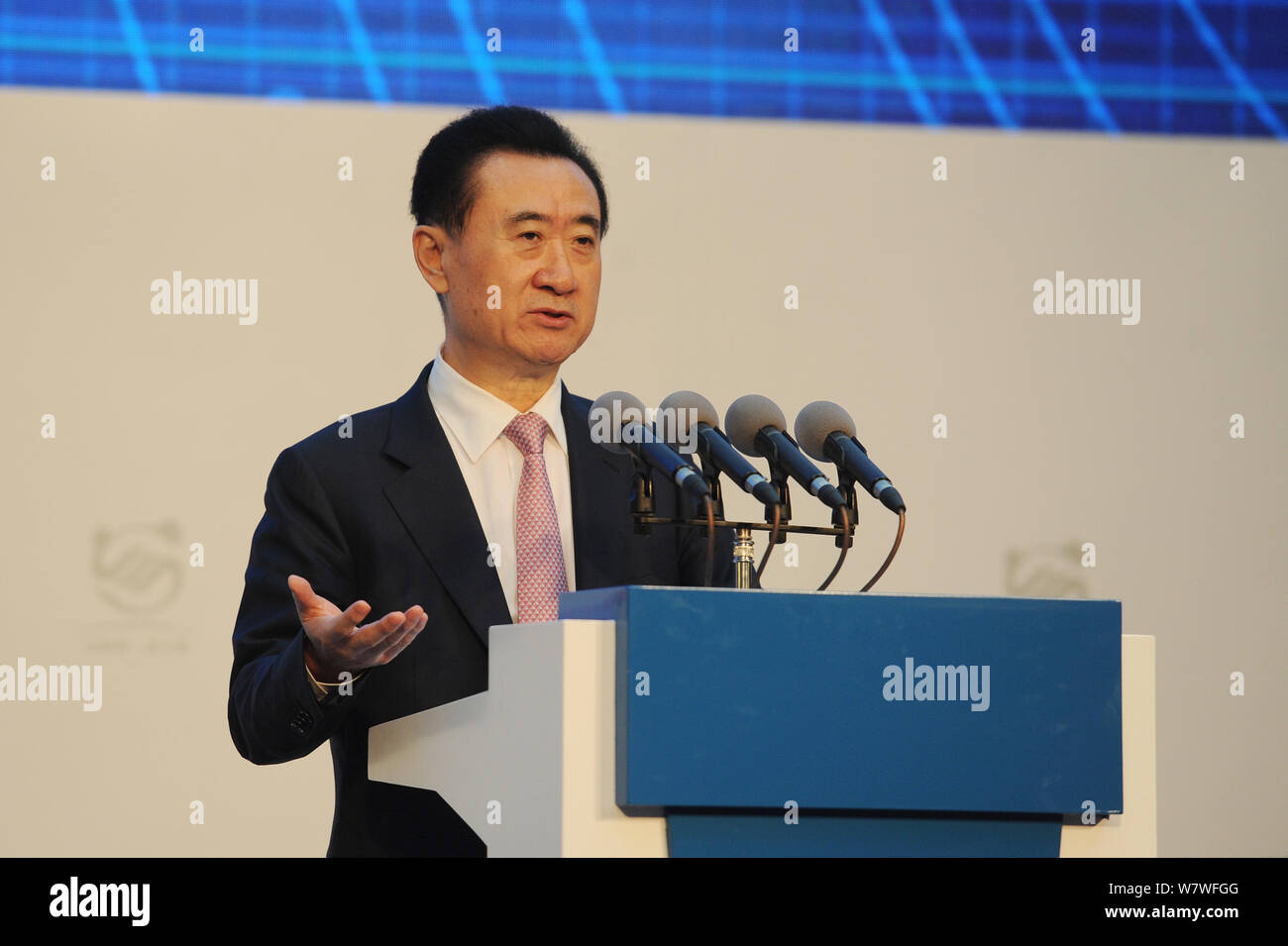 Wang Jianlin, Chairman of Wanda Group, delivers a speech during a ...