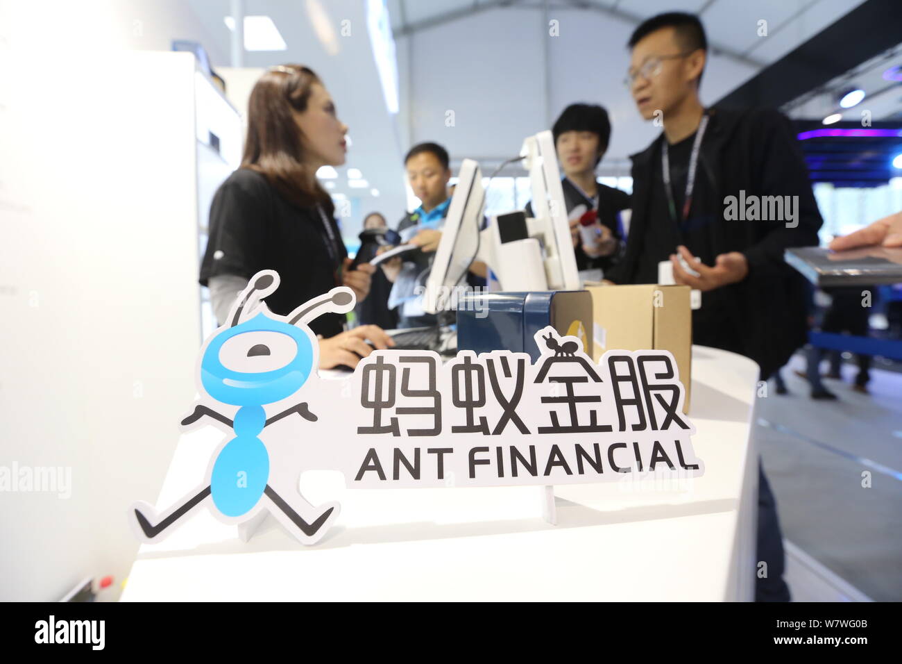 --FILE--Visitors are seen at the stand of Ant Financial, the online ...