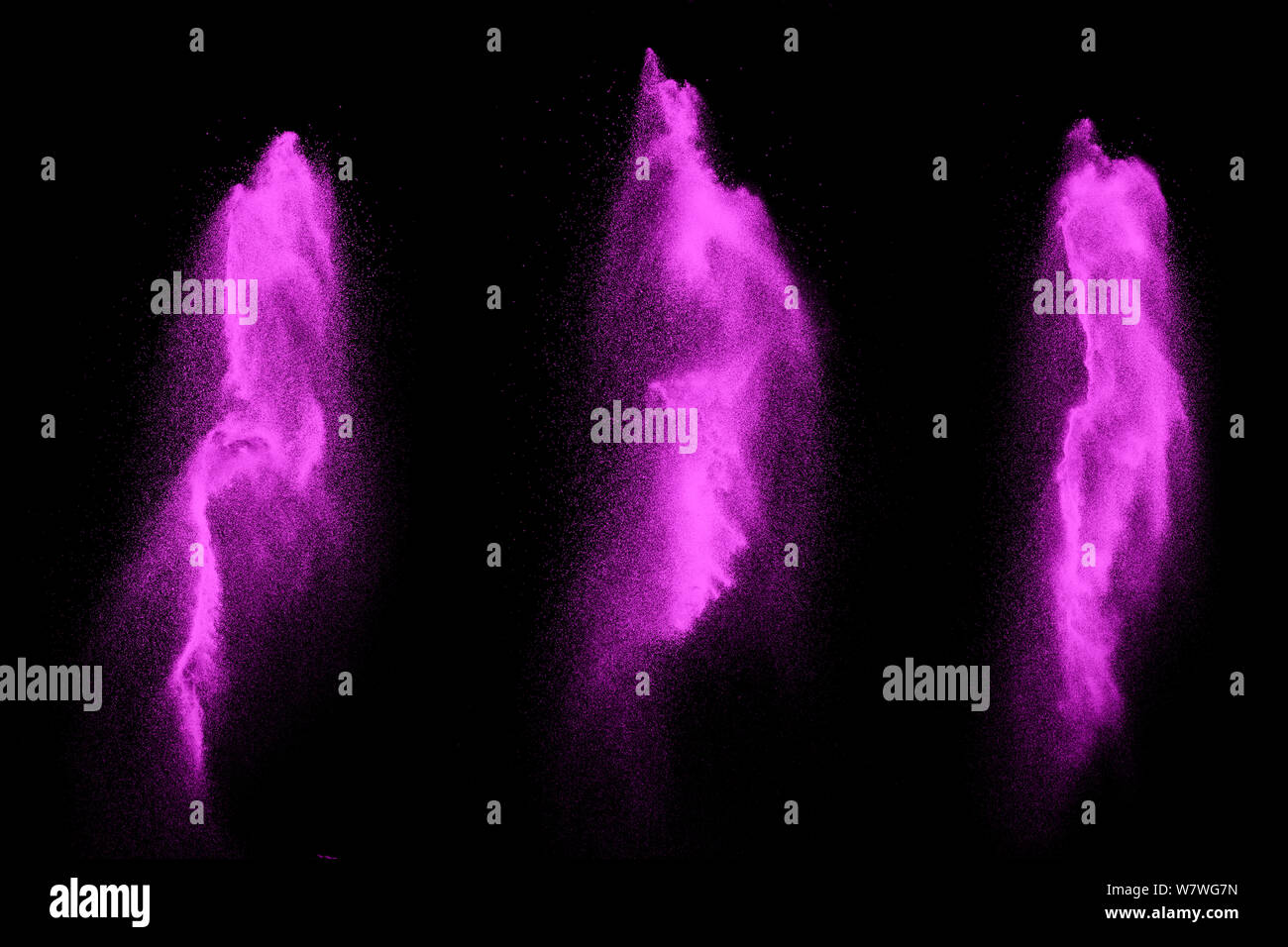 Pink particles splatter on black background. Pink powder exploding ...