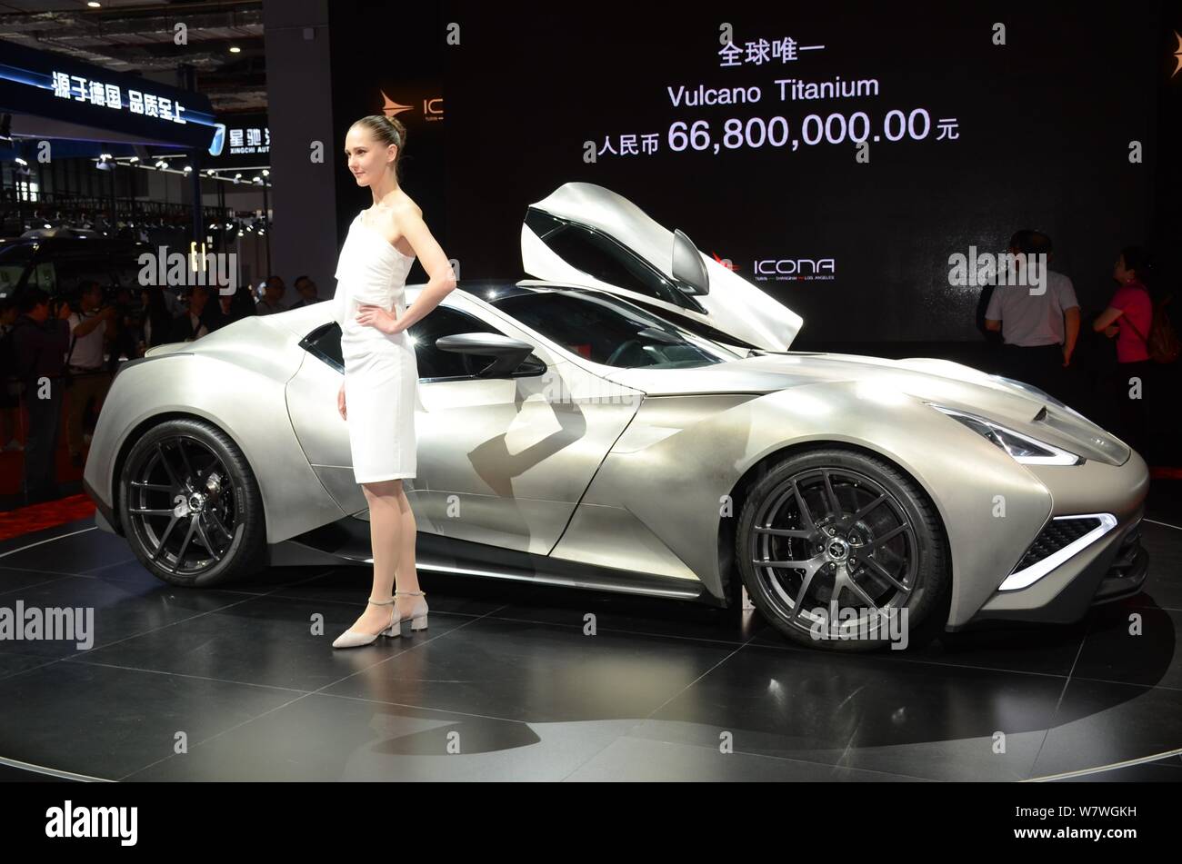 A model poses with a Vulcano Titanium super sports car of Icona on ...