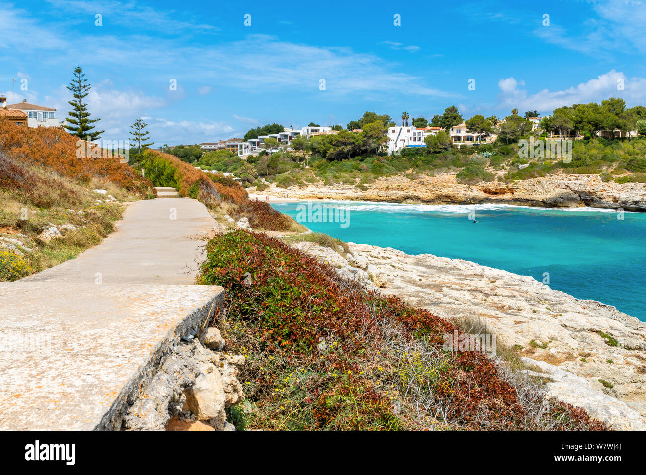 Cala Mandia beach holidays summer Stock Photo - Alamy