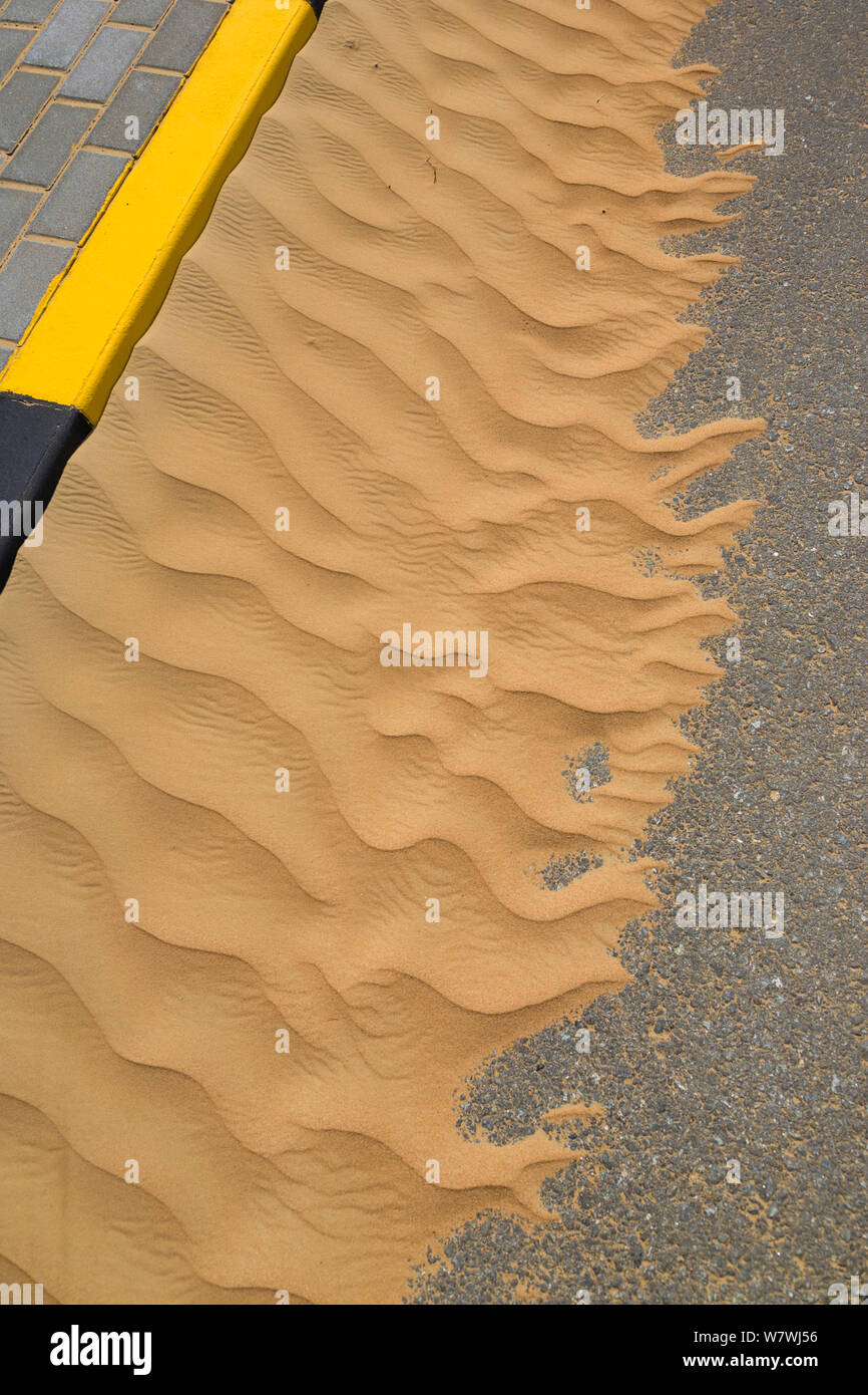 Sand patterns at curb of road, curb, Dubai, United Arab Emirates Stock ...