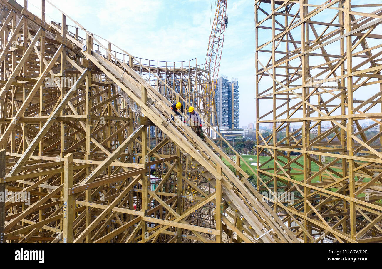 Aerial view of the construction site of a wooden roller coaster at ...