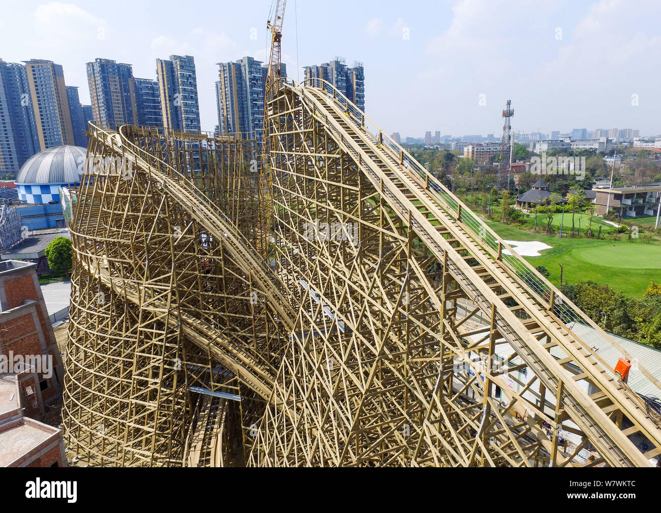 Aerial view of the construction site of a wooden roller coaster at ...