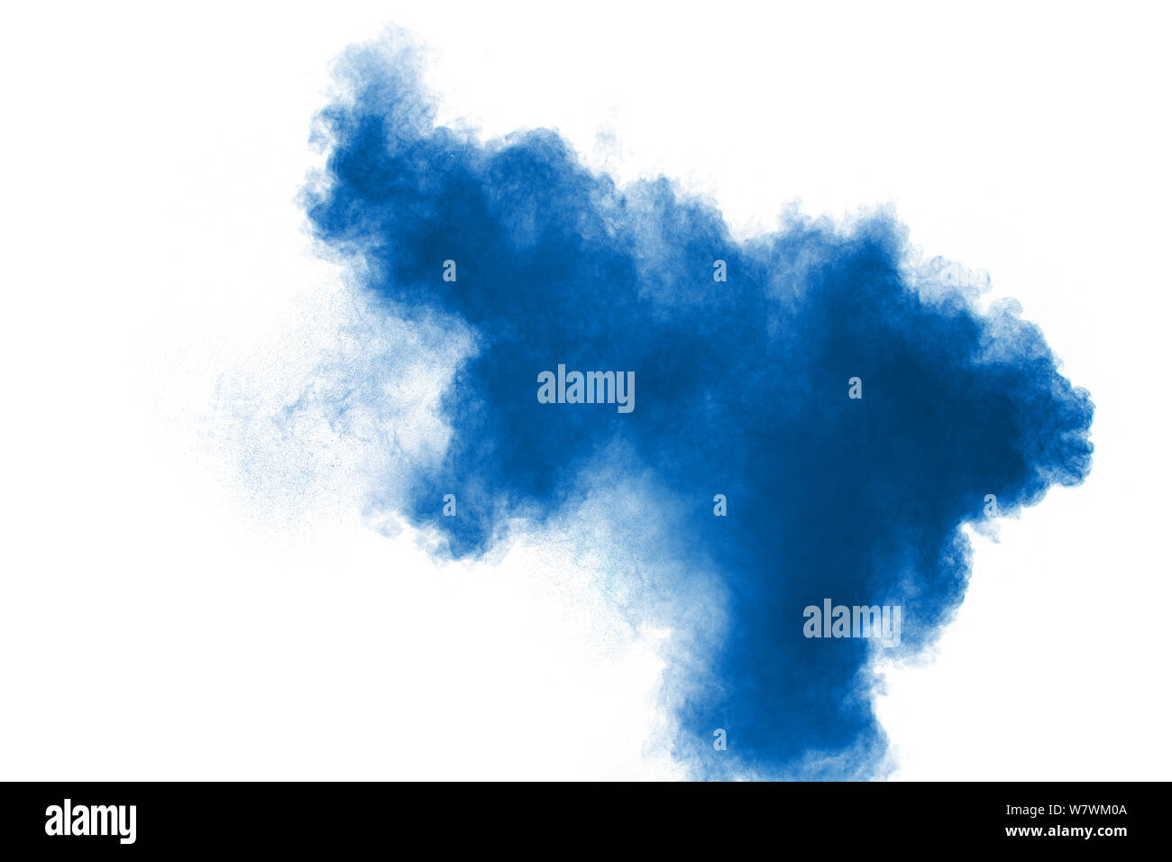 Blue color powder explosion cloud on white background.Closeup of Blue ...
