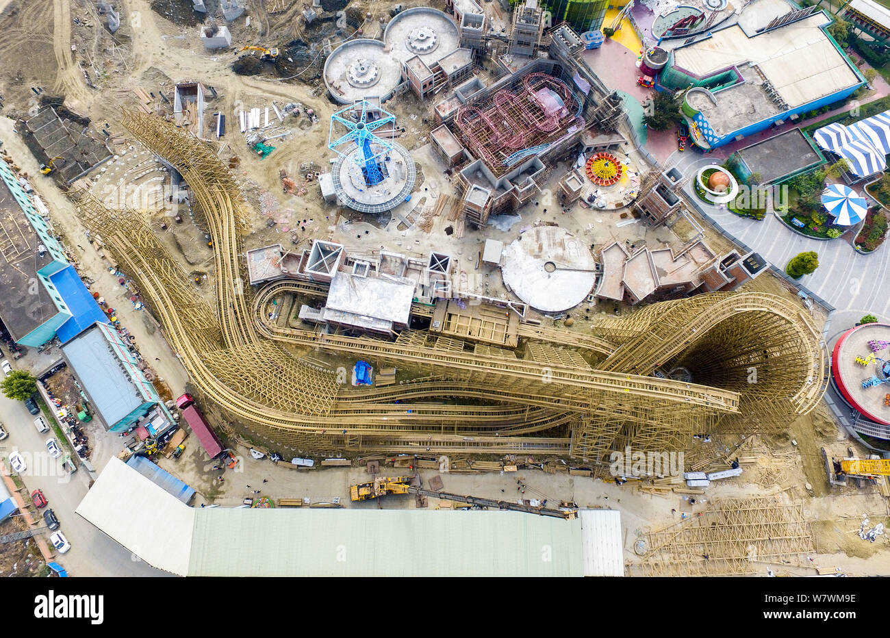 Aerial view of the construction site of a wooden roller coaster at ...