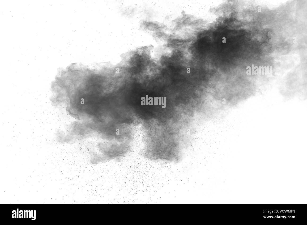 Black powder explosion on white background.Black dust particles splash ...