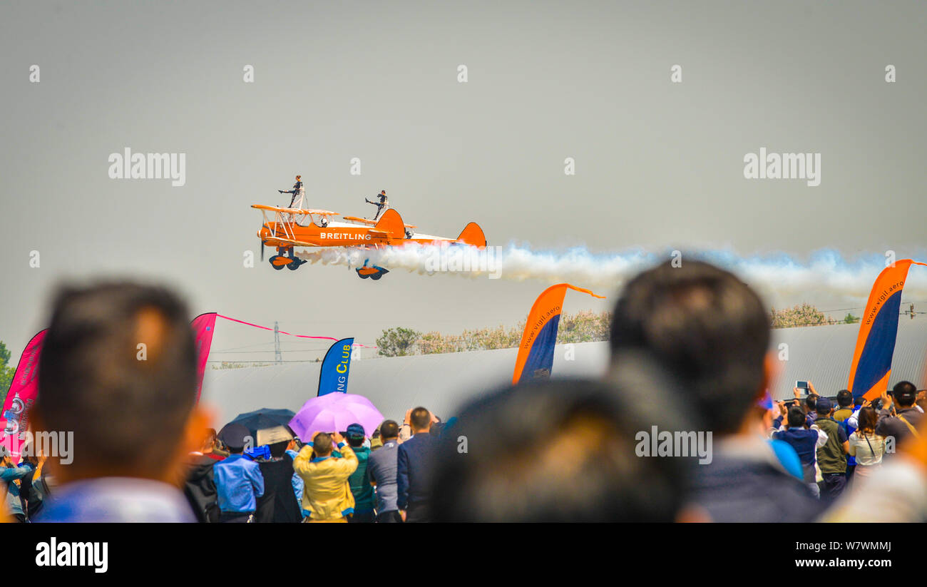 Locals watch British aerobatics and wingwalking team AeroSuperBatics ...