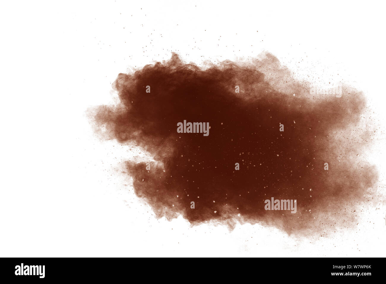 Freeze motion of brown powder exploding. Abstract design of color ...