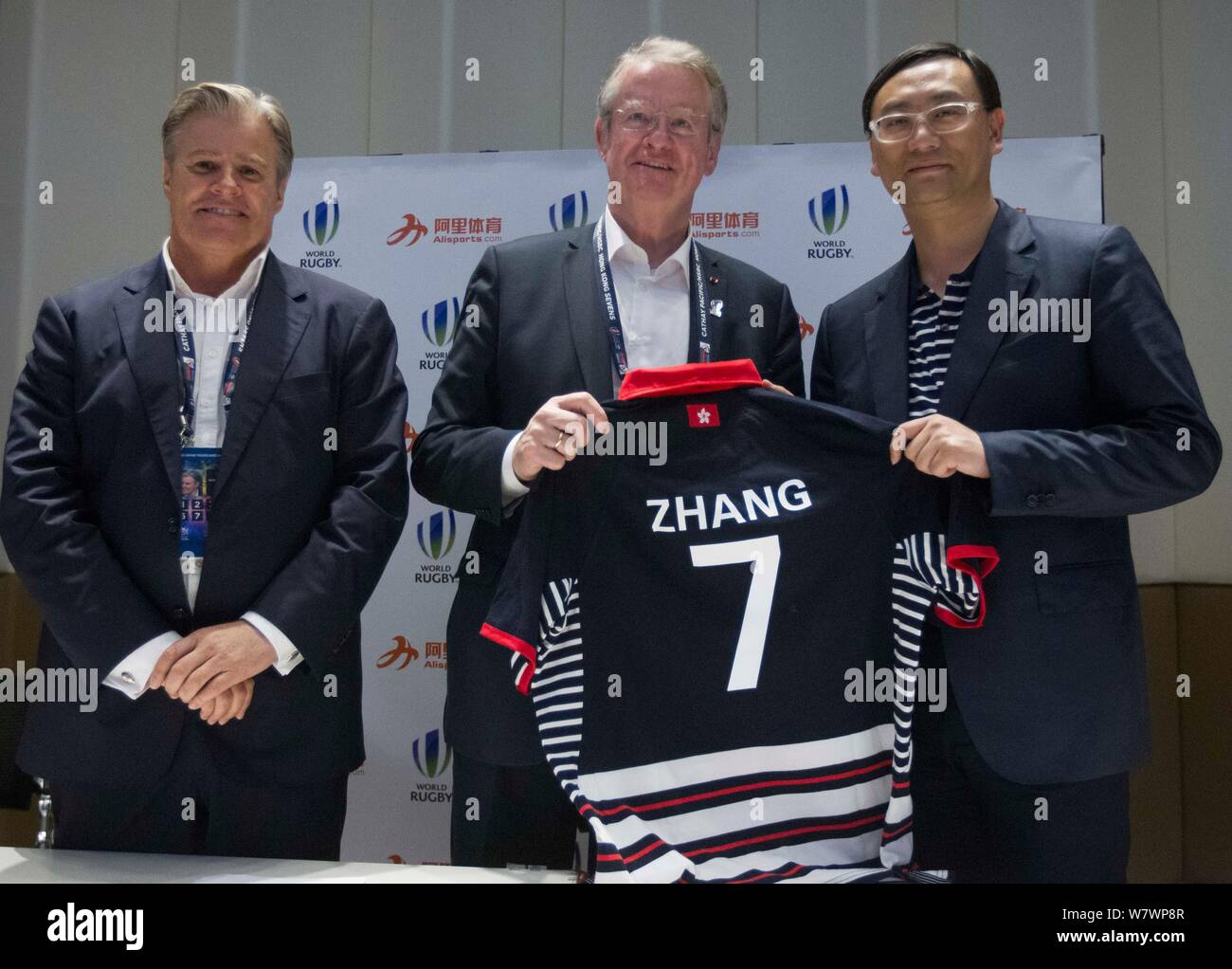 --FILE--(From left) World Rugby CEO Brett Gosper, World Rugby Chairman ...