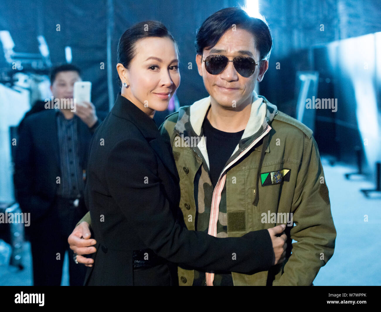 Hong Kong actress Carina Lau, left, and her actor husband Tony leung chiu wai, pose during the ...