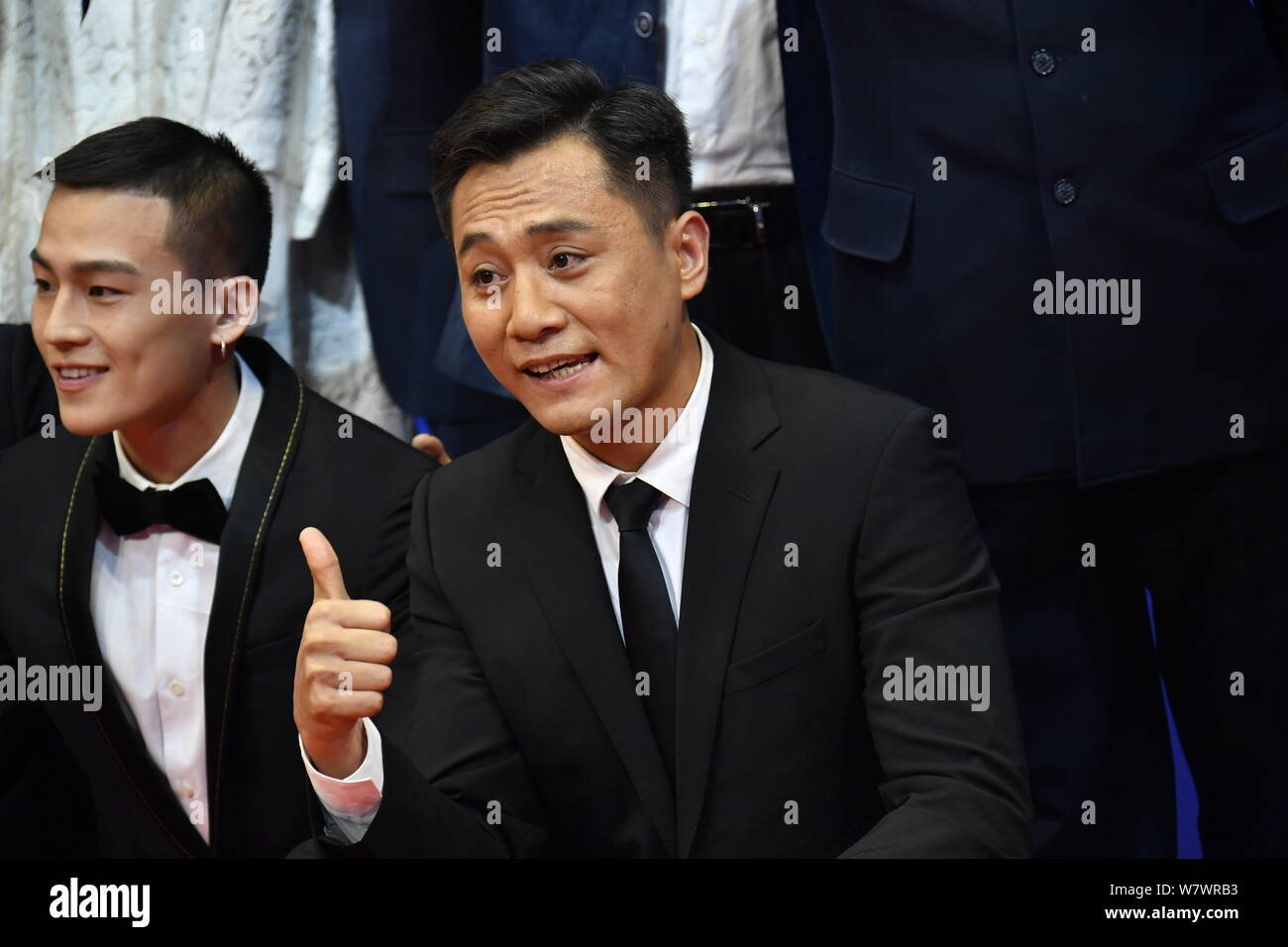 Chinese actor Liu Ye arrives on the red carpet for the opening ceremony ...