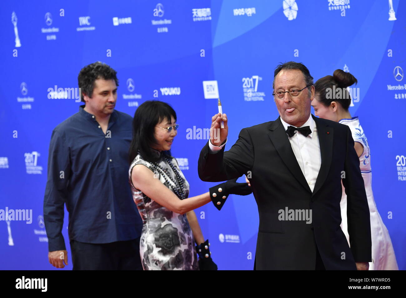 French actor Jean Reno, right, and other members of the Tiantan Award ...
