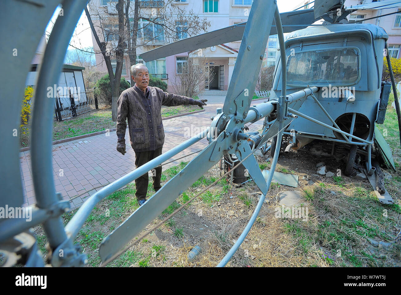 Chinese octogenarian Gu Anguo shows his home-made helicopter after ...