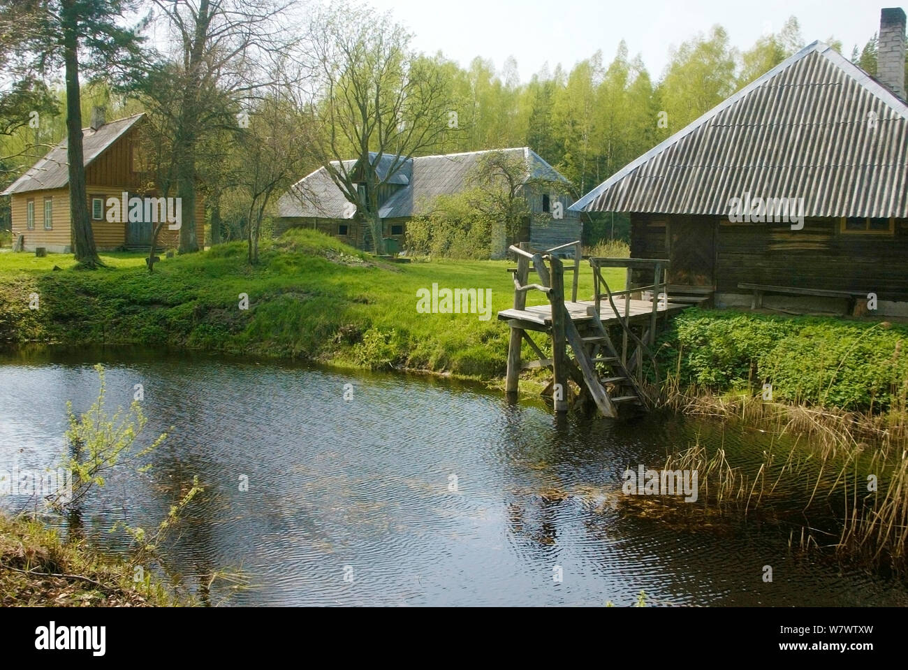 Traditional farm next to river, Riga, Latvia, May 2002 Stock Photo - Alamy