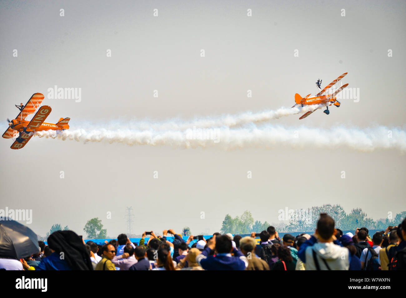 Locals watch British aerobatics and wingwalking team AeroSuperBatics ...