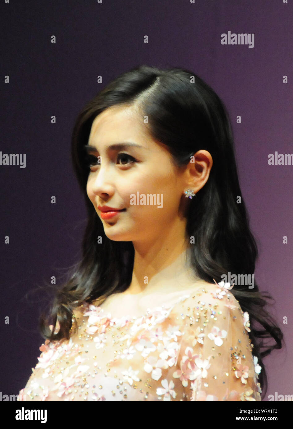 Hong Kong model and actress Angelababy attends a promotional event for LUX in Shanghai, China ...