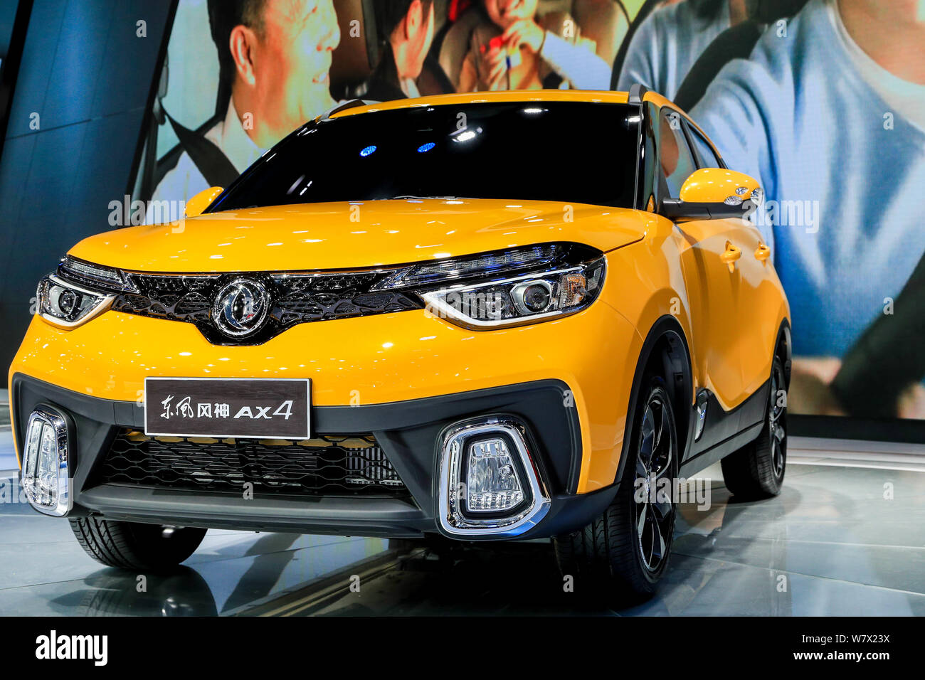 A Dongfeng Fengshen AX4 Crossover SUV is on display during the 17th ...