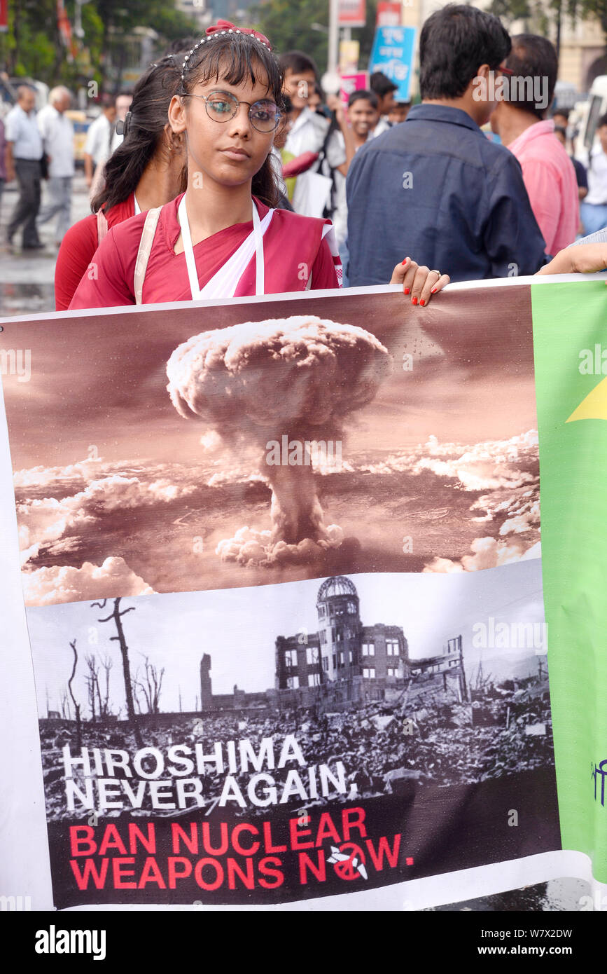 School students hold poster to create awareness the effect of nuclear ...