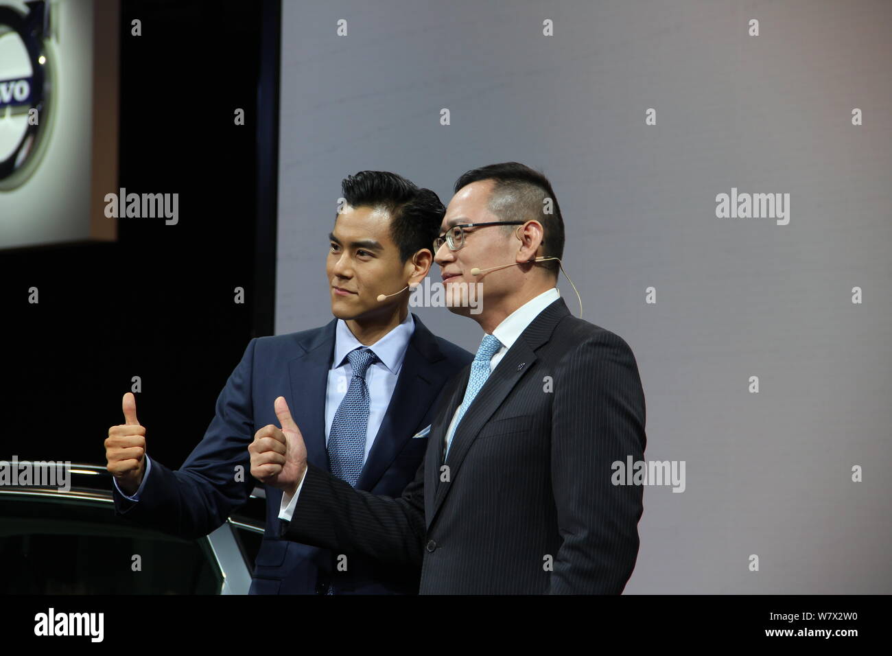 Taiwanese actor Eddie Peng, left, and Xiaolin Yuan, senior vice ...