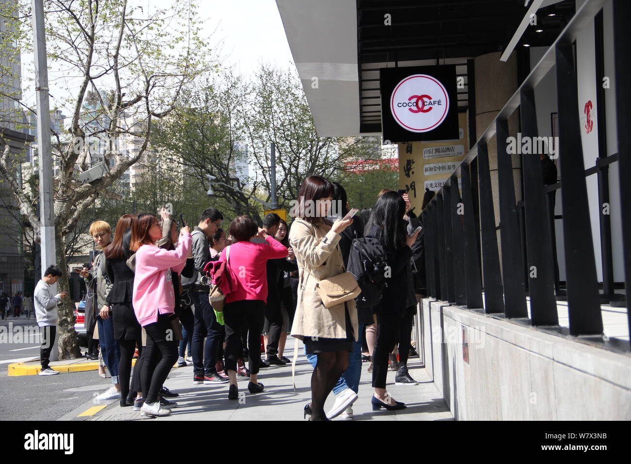 Chinese customers queue up in front of the Coco Chanel Cafe on West ...