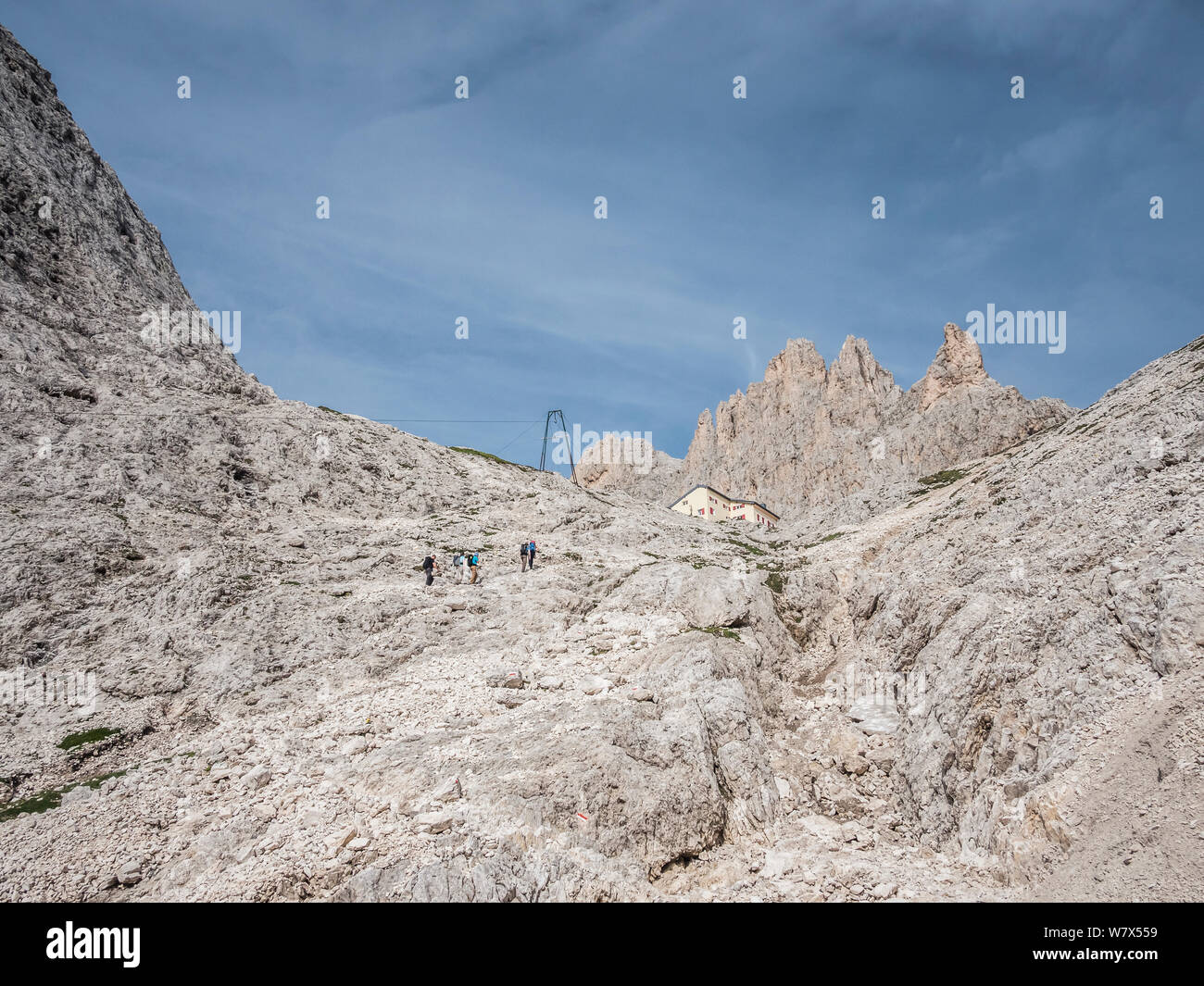 Trekkers vacate the Gartl hut refuge also known as the Refugio Alberto ...