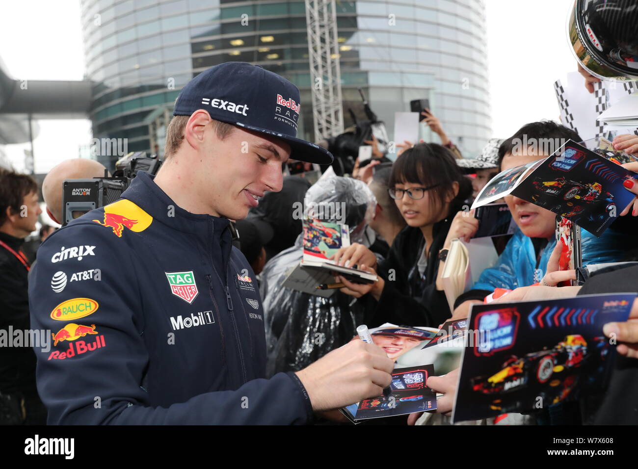 Dutch F1 driver Max Verstappen of of Red Bull Racing signs autographs ...