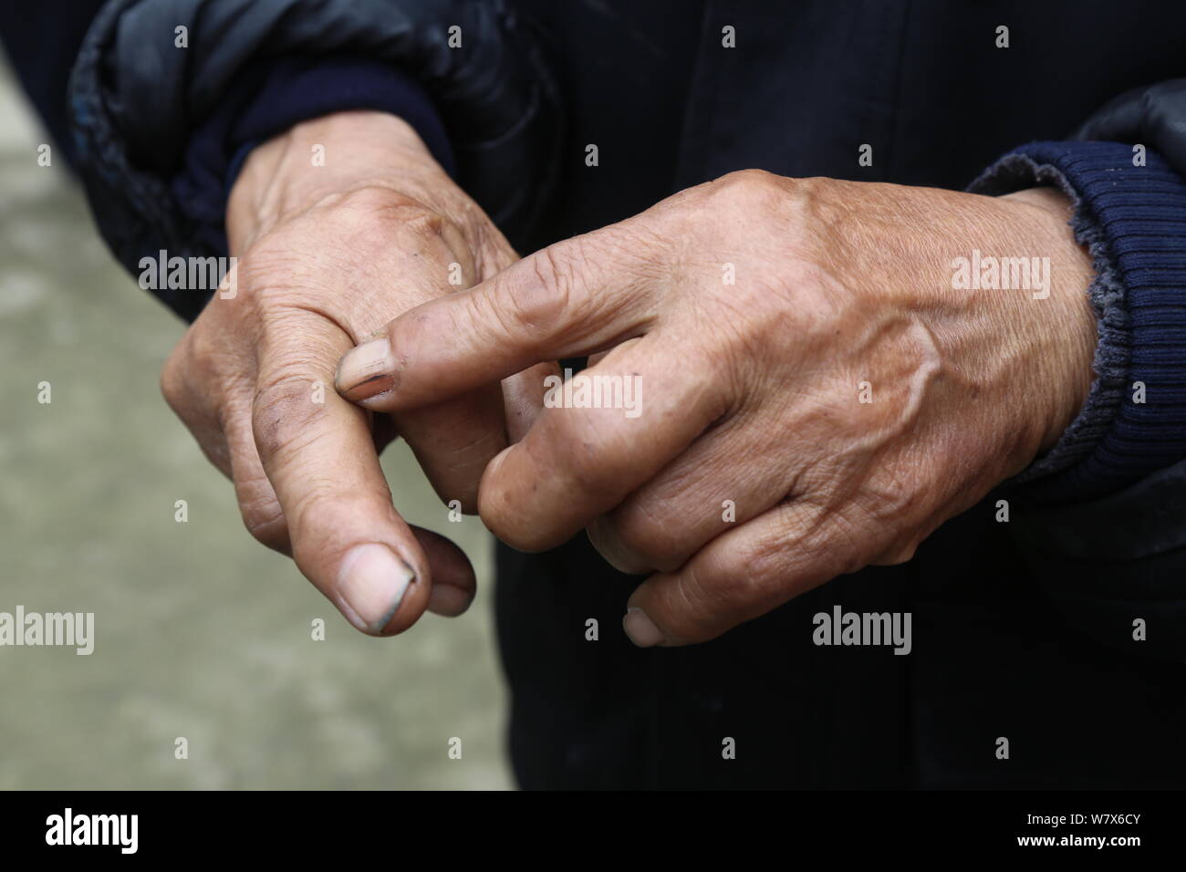 --FILE--81-year-old Chinese man Huang Dafa, persuading and then leading ...