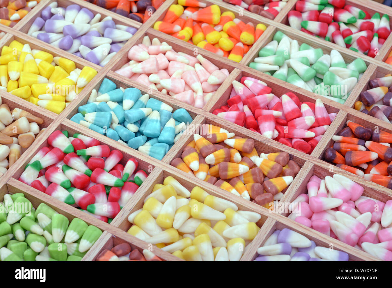 colorful candy corn box display at market place Stock Photo - Alamy