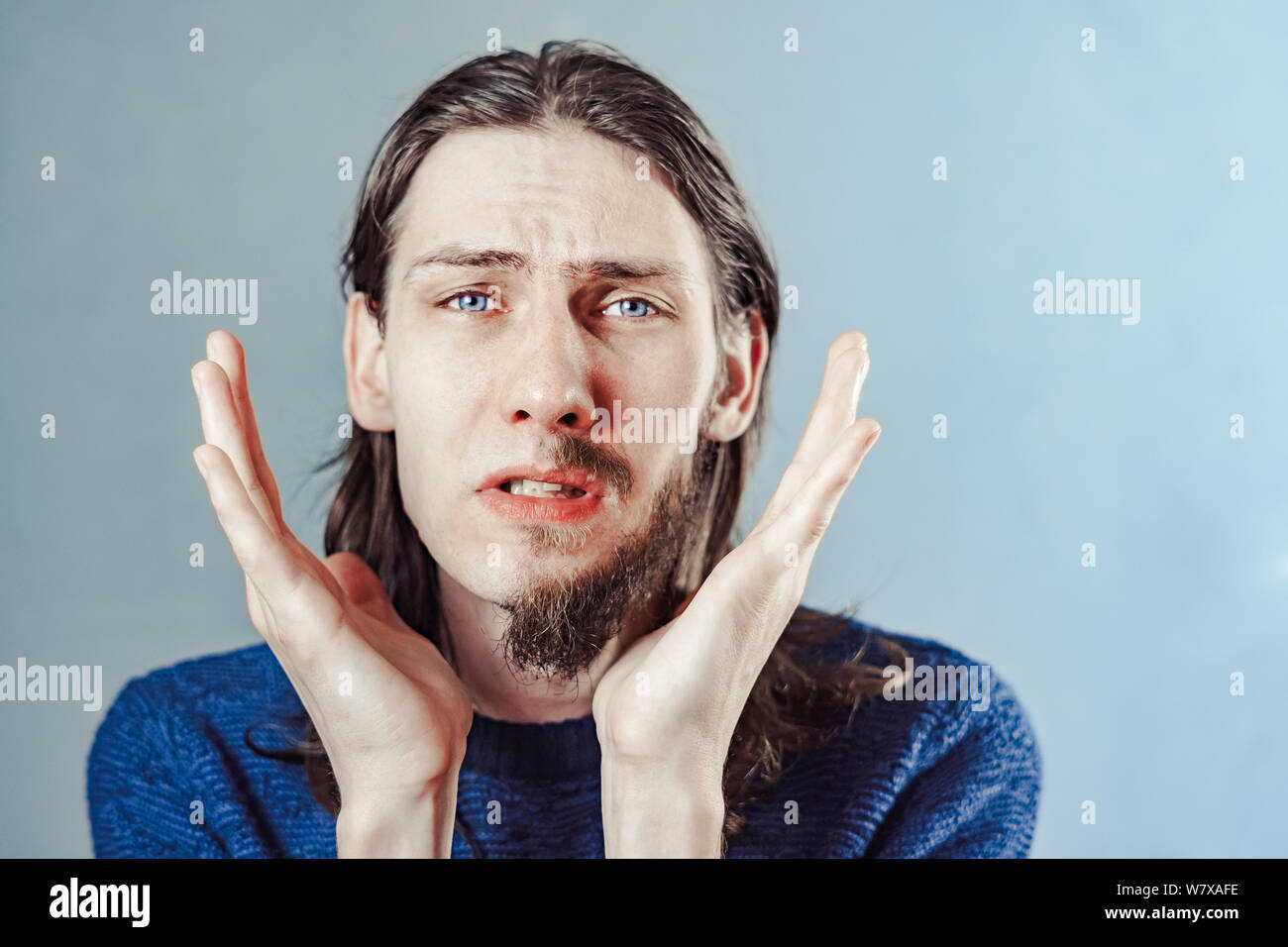 the guy with the long hair and the half-face beard Stock Photo - Alamy