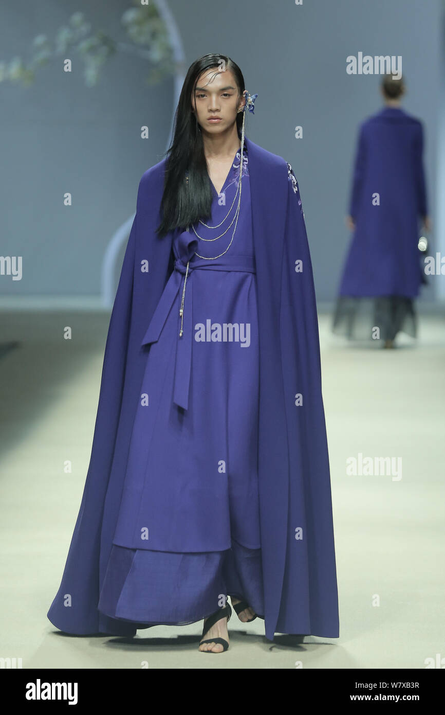 A model displays a new creation at the fashion show of Heaven Gaia by ...