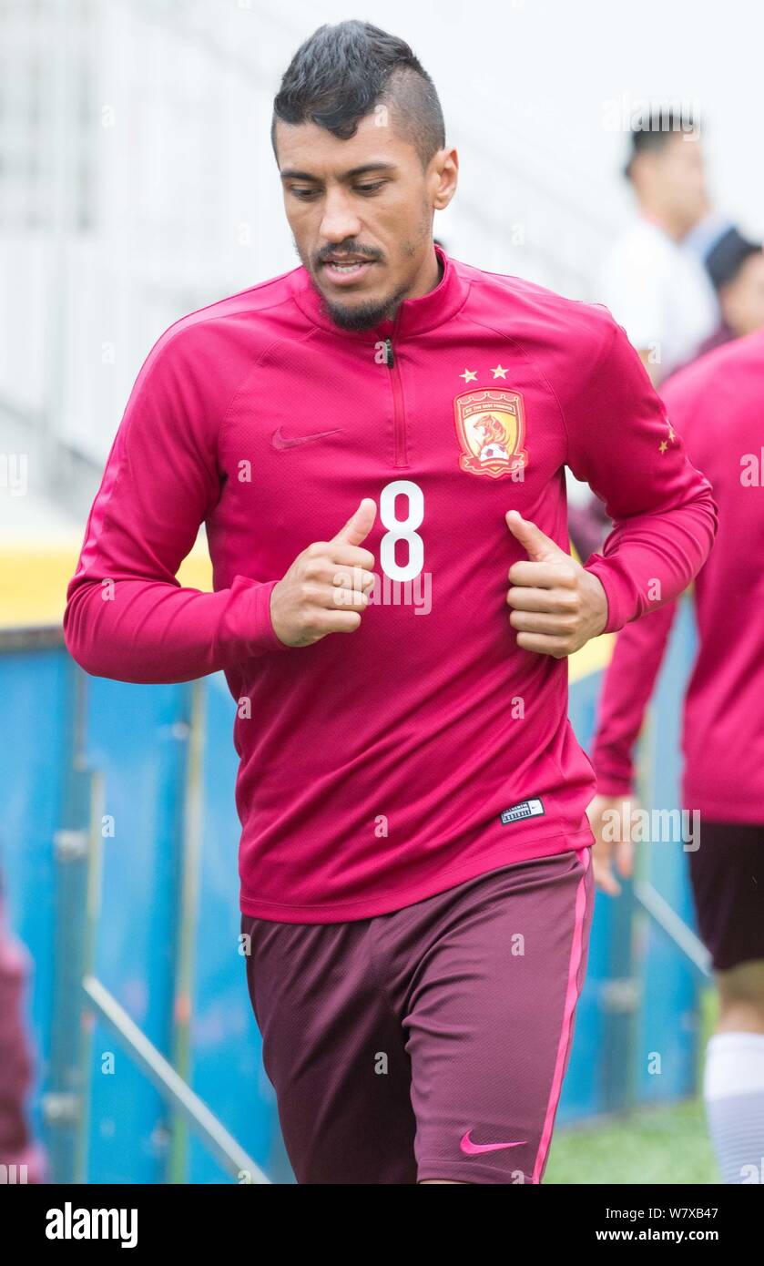 Brazilian football player Paulinho of Guangzhou Evergrande takes part ...