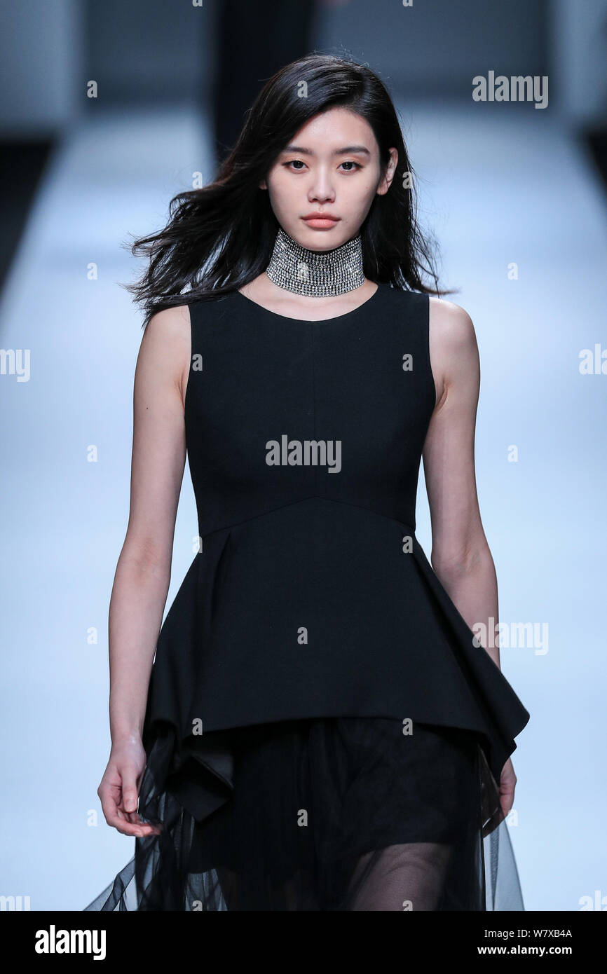 Chinese model Xi Mengyao, better known as Ming Xi, displays a new creation at the fashion show ...