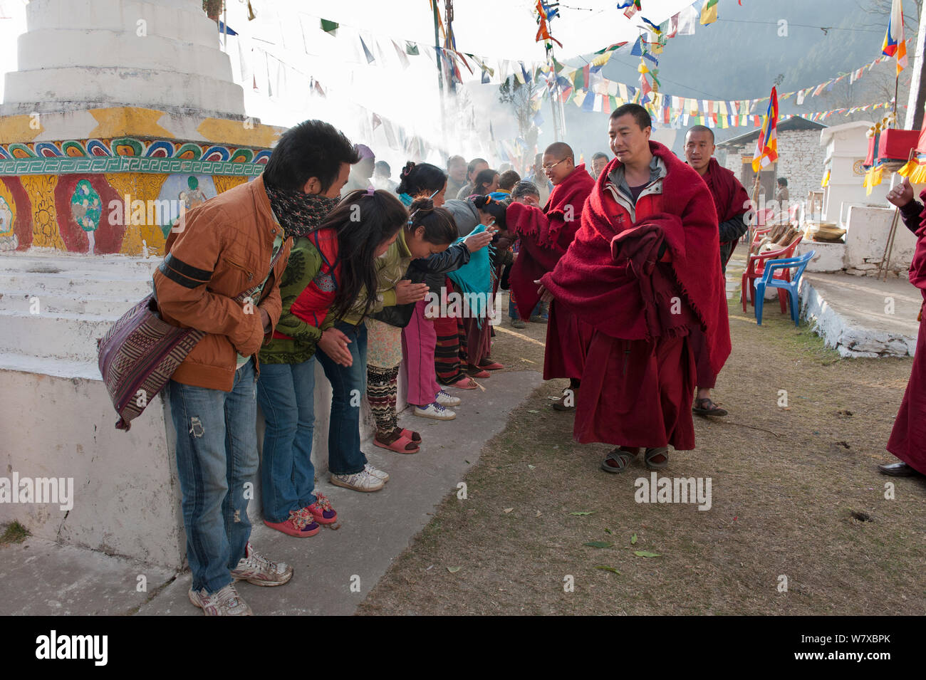 Monks blessing the people at the end of a local Buddhist festival in ...
