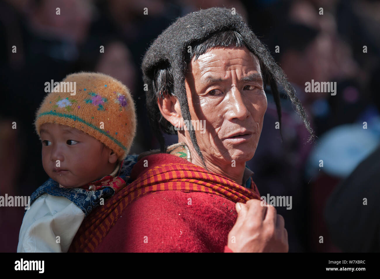Man in traditional Mompa tribe dress (typical head dress made from Yak ...