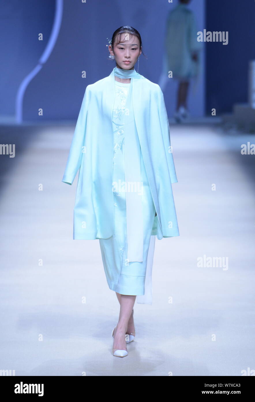 A model displays a new creation at the fashion show of Heaven Gaia by ...