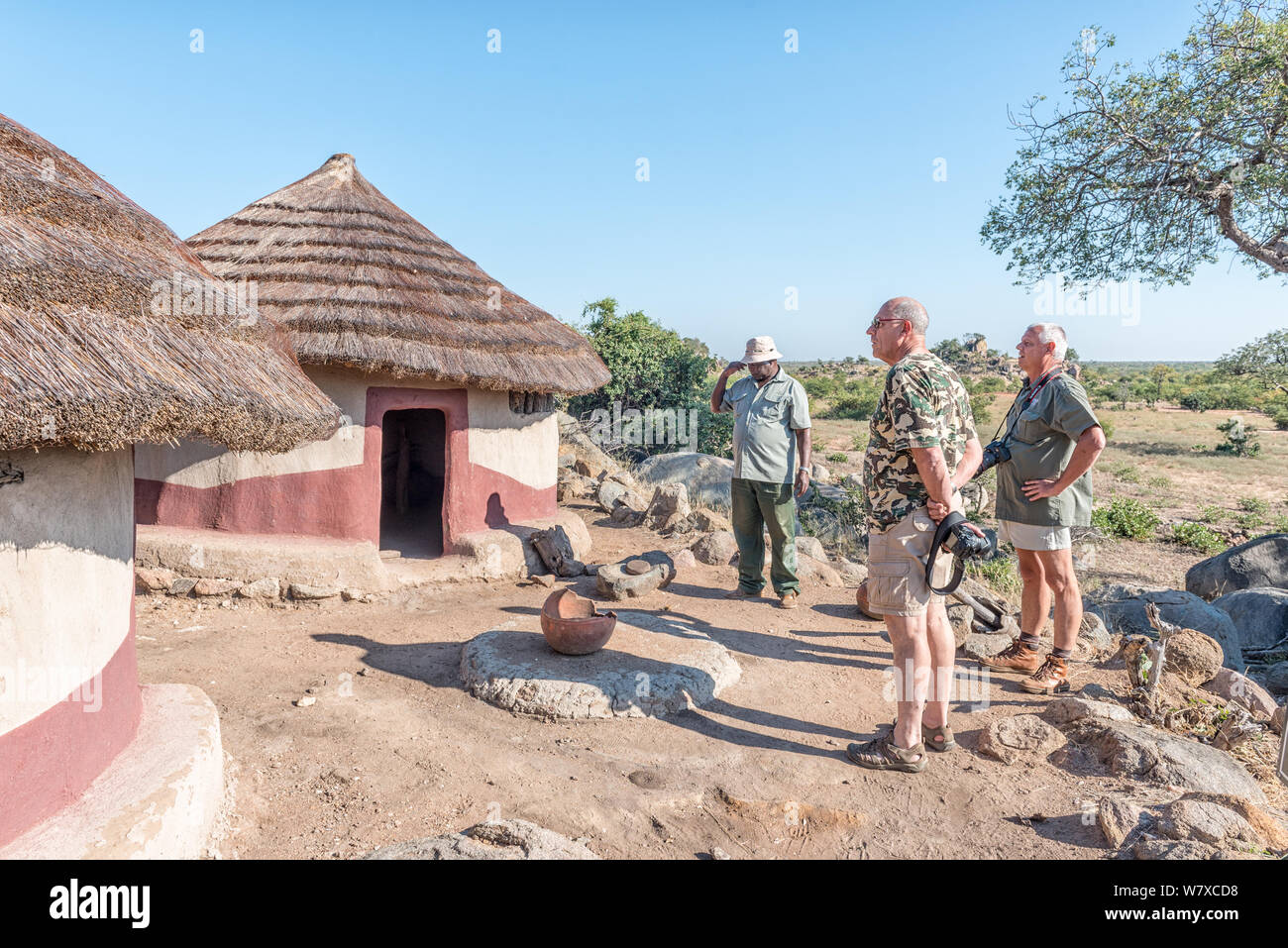 KRUGER NATIONAL PARK, SOUTH AFRICA - MAY 9, 2019: Tourists and a guide ...