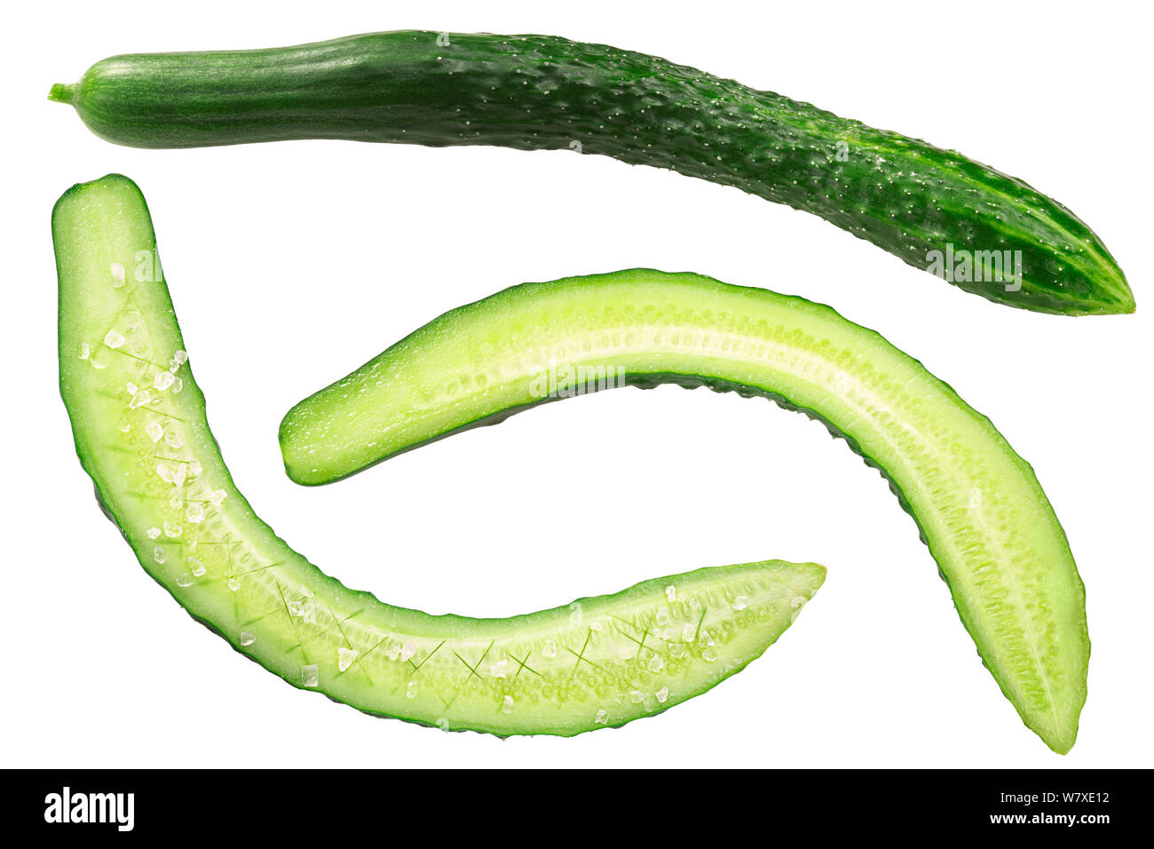 Long cucumbers (Cucumis sativus fruits), whole, halved and salted ...