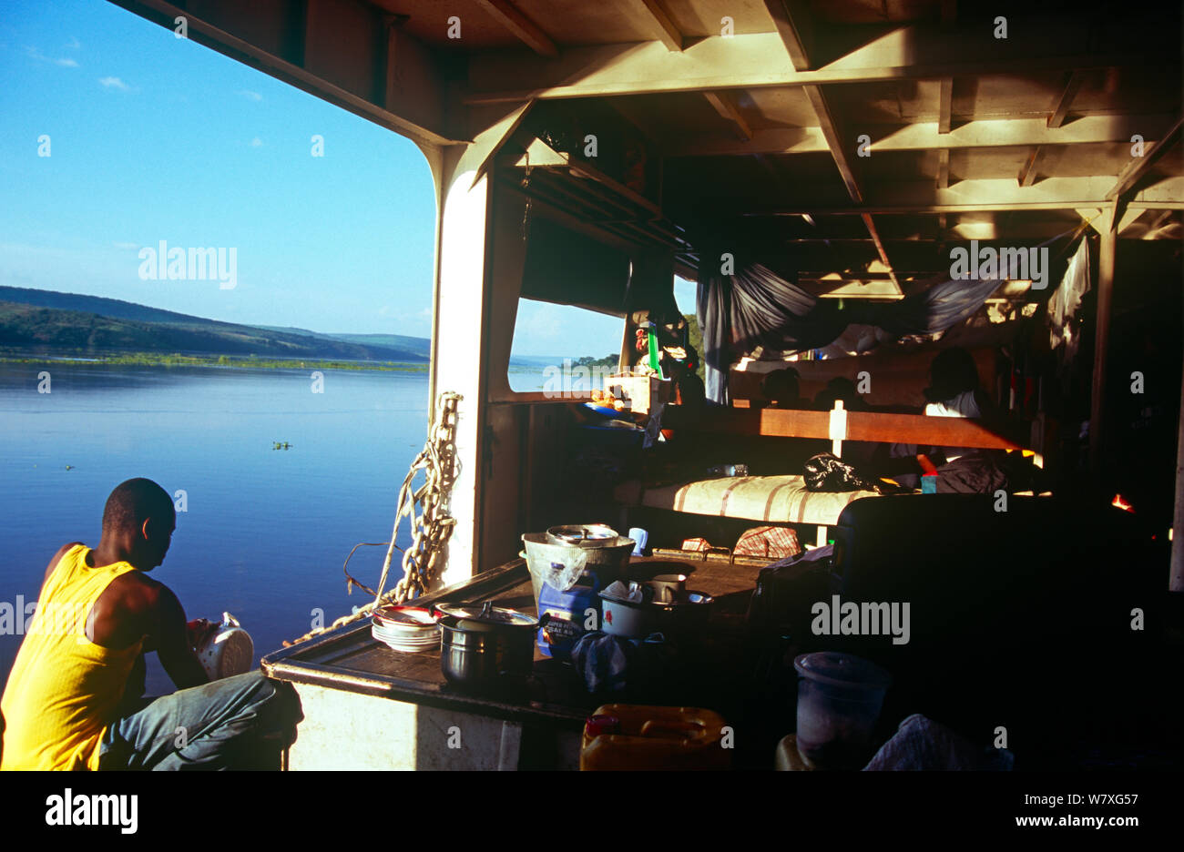 Boat travelling down the Congo river on the journey to Kisangani ...