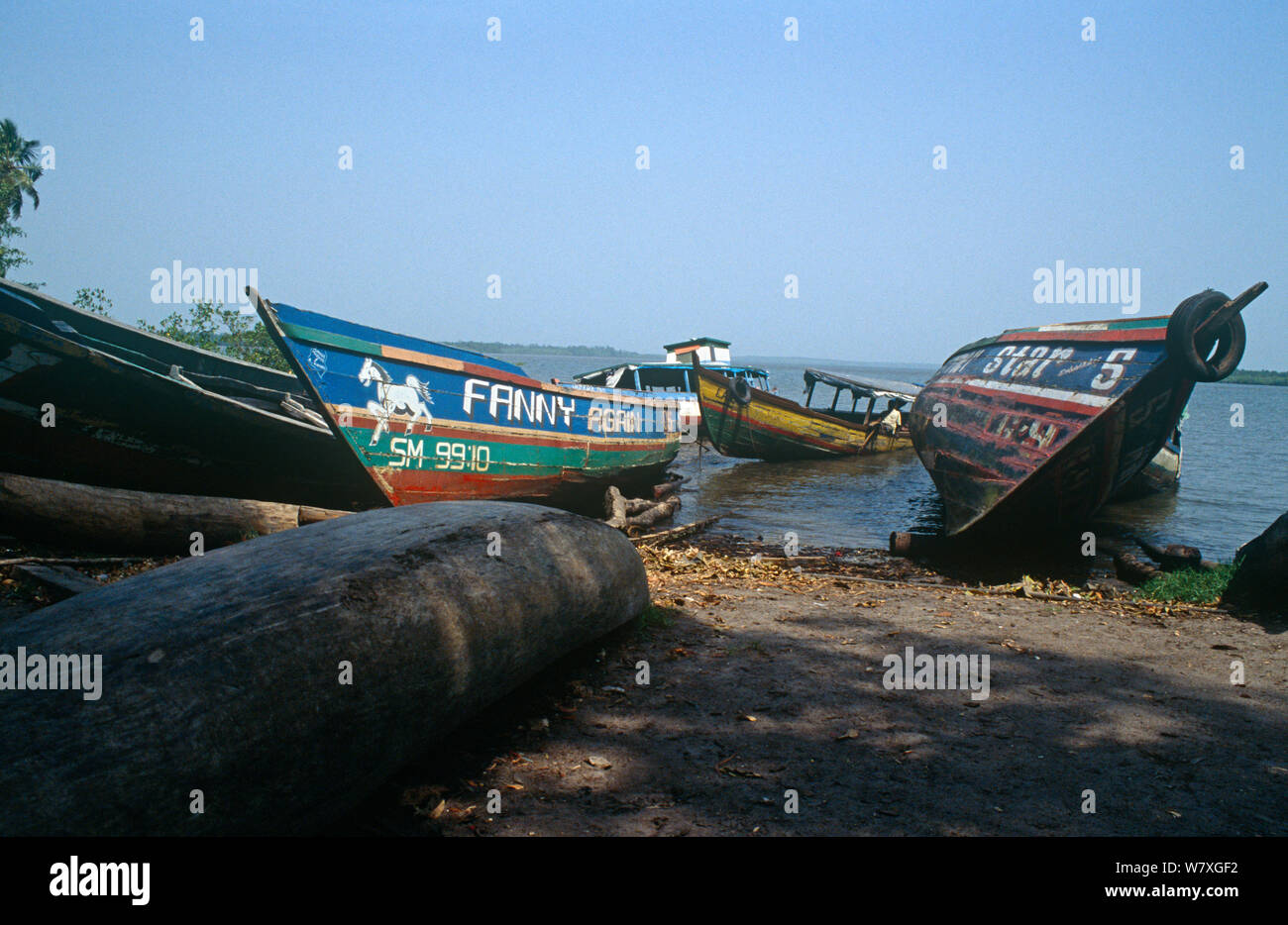 Passenger boats and fishing canoes. Sherbro Island, Sierra Leone, 2004 ...