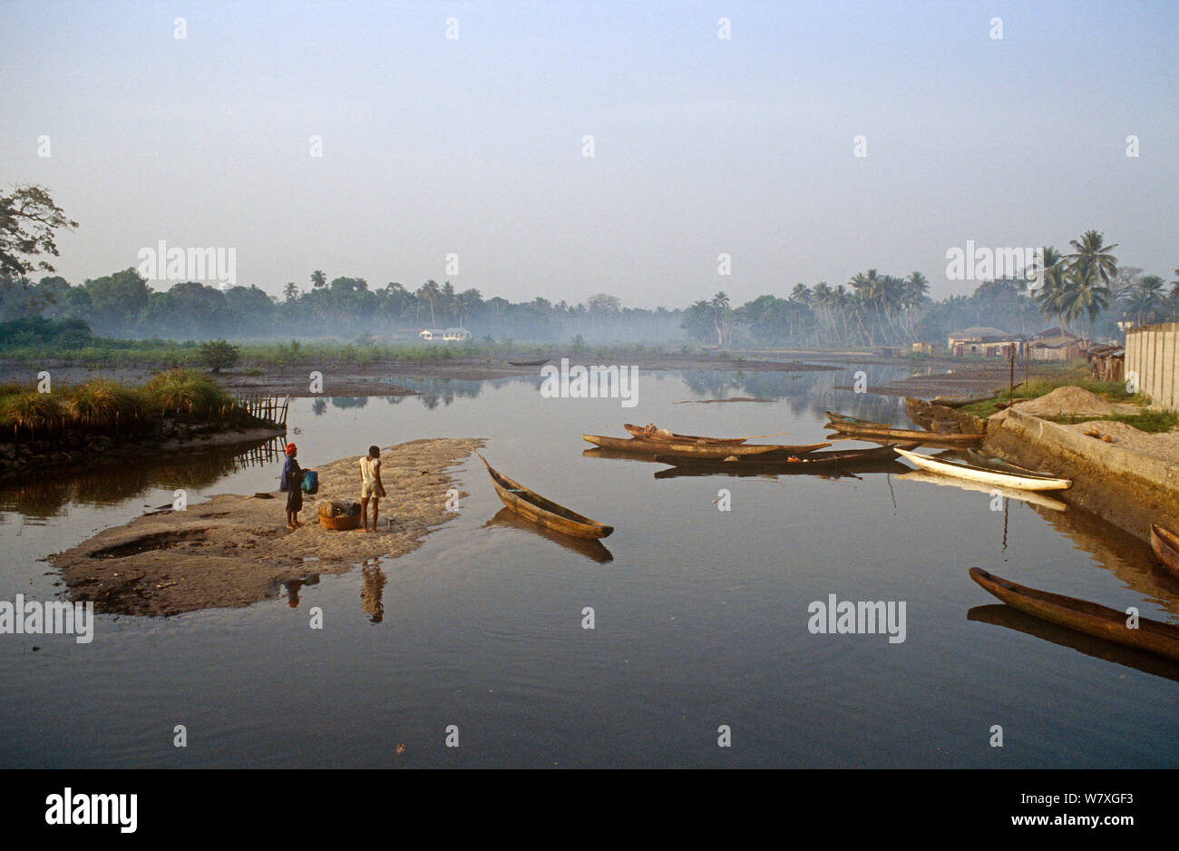 Fishing canoes on water, Sherbro Island, Sierra Leone, 2004-2005 Stock ...
