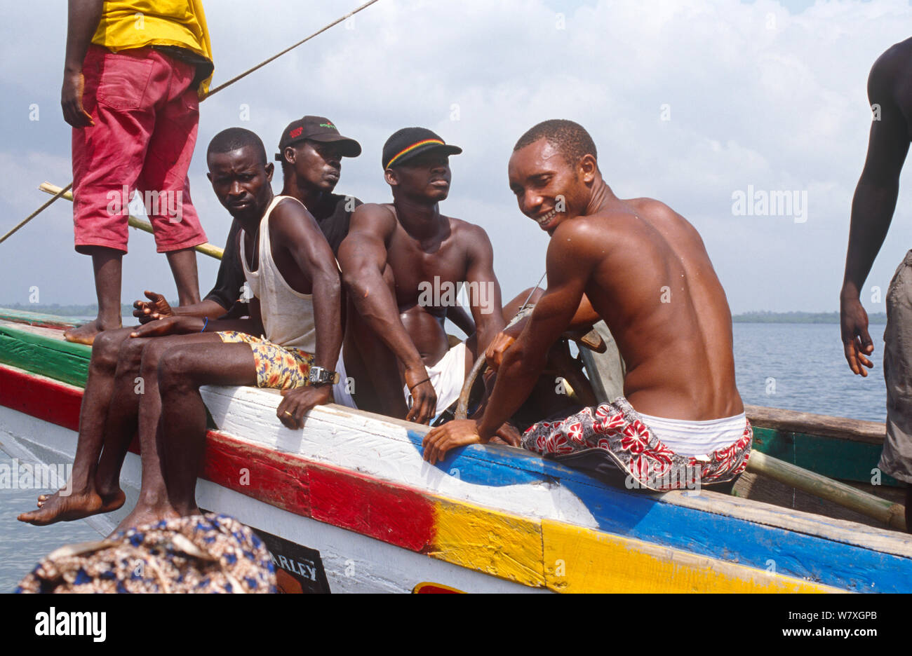 Passengers aboard cargo service to Port Loko. Sierra Leone, 2004-2005 ...