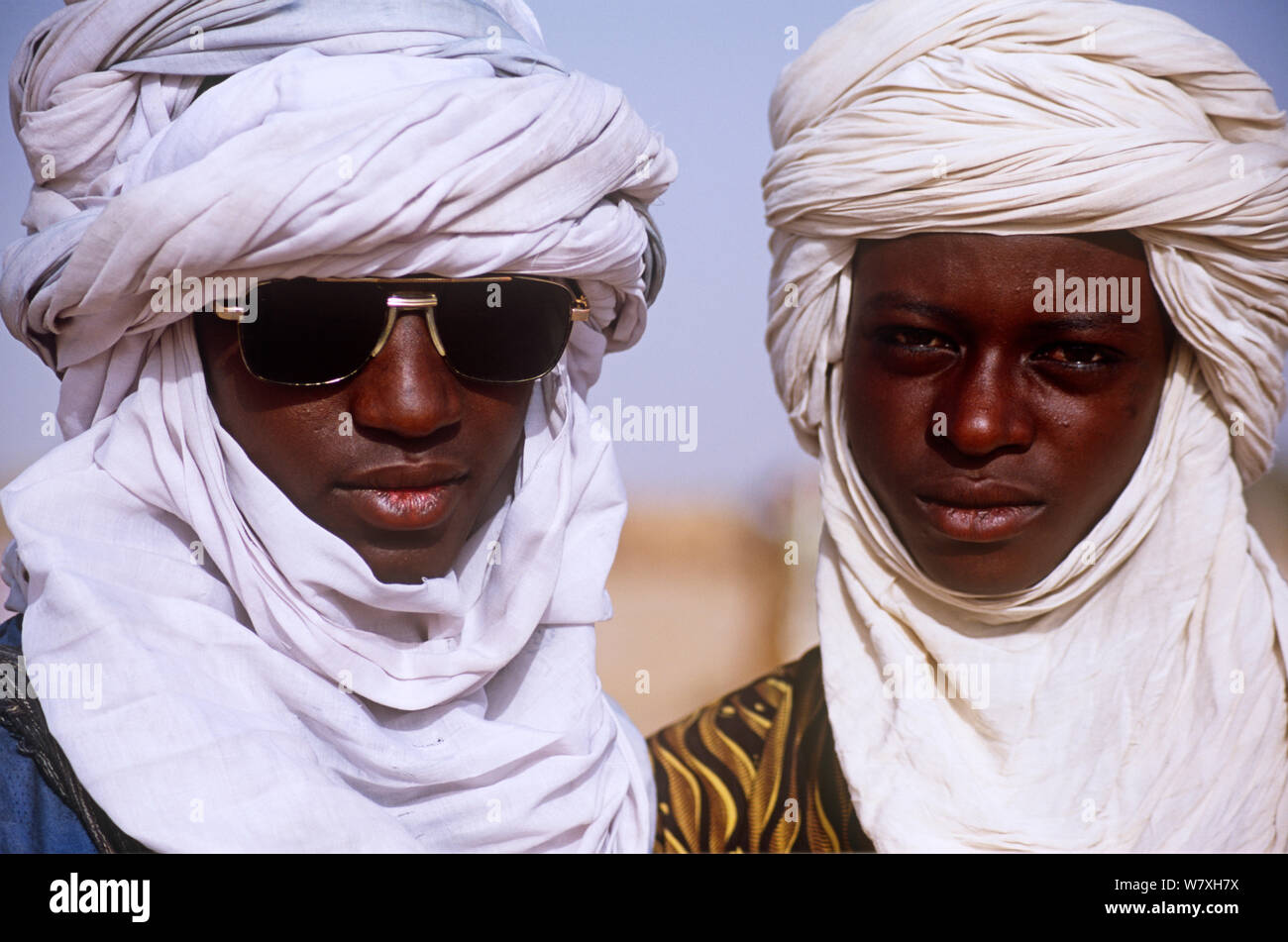 Portrait of two Peul / Fula men, one wearing sunglasses, at Ngarawal ...