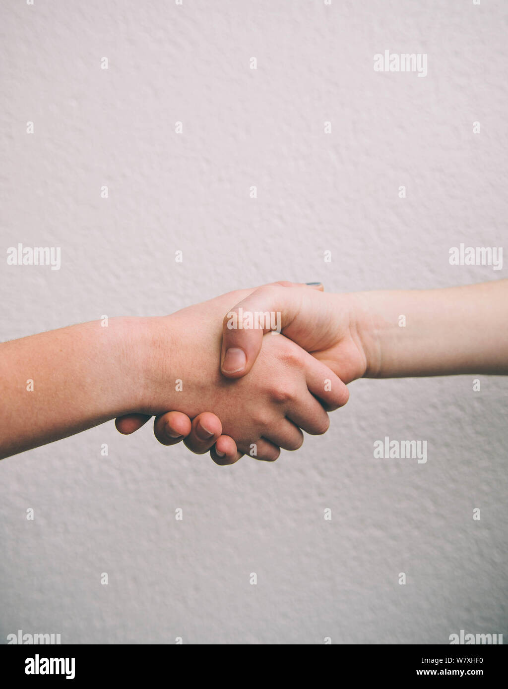 handshake in unity Stock Photo - Alamy
