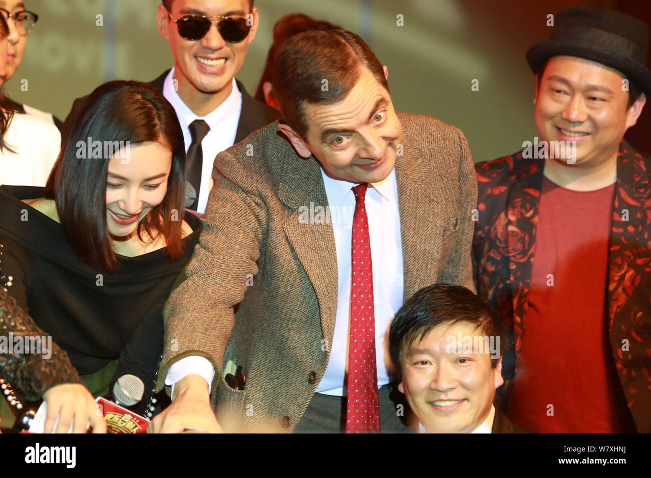 English actor Rowan Atkinson, center, plays Mr. Bean during a premiere ...