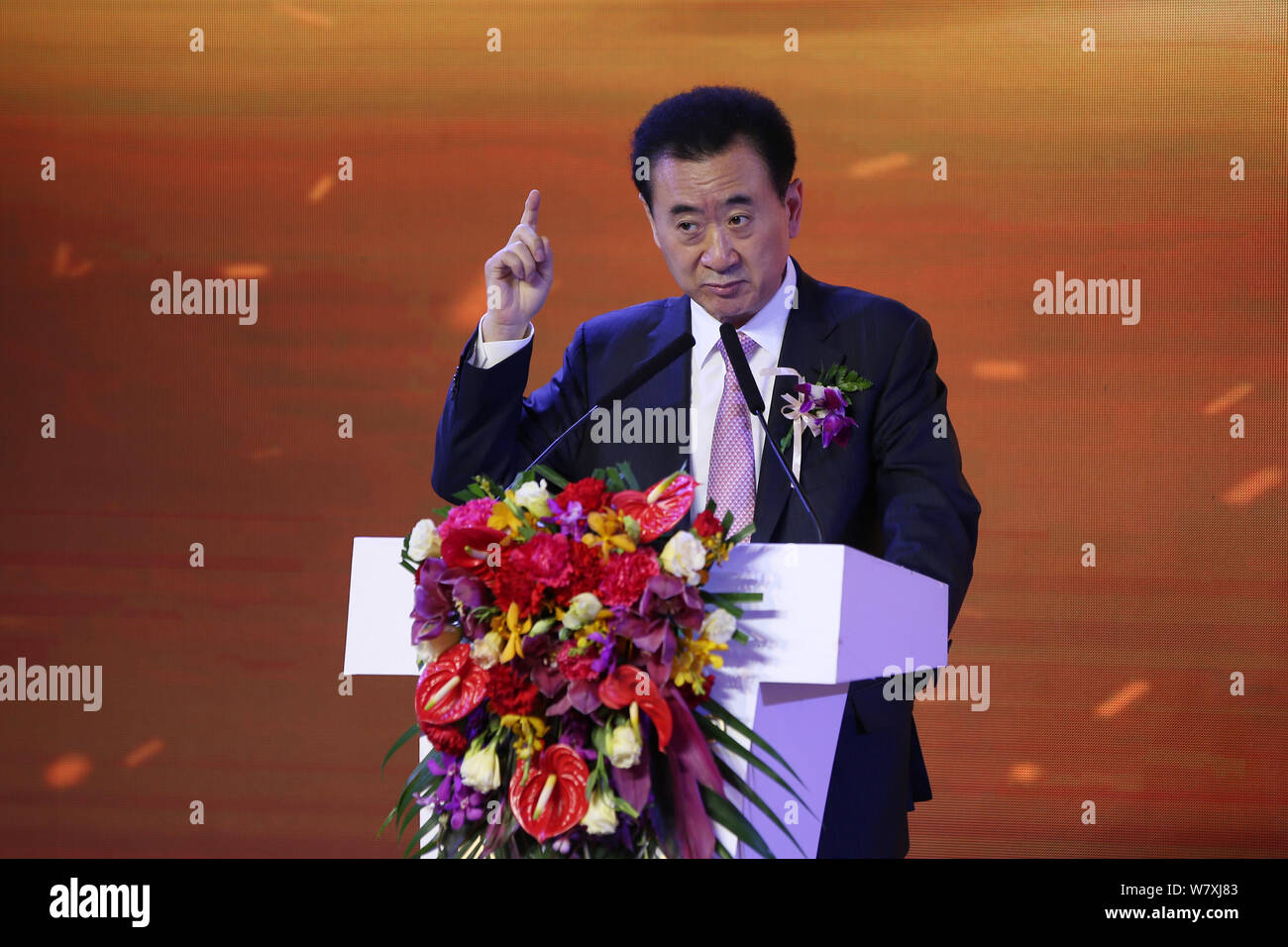 Wang Jianlin, Chairman of Wanda Group, delivers a speech during a ...